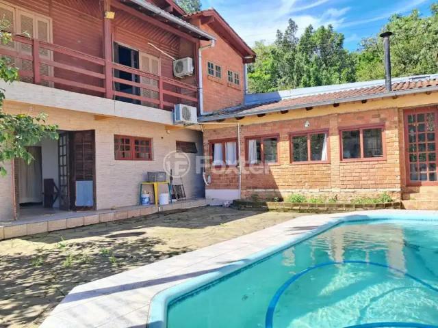 Casa / Sobrado para Venda em Porto Alegre/RS Vila Nova 3 Quartos