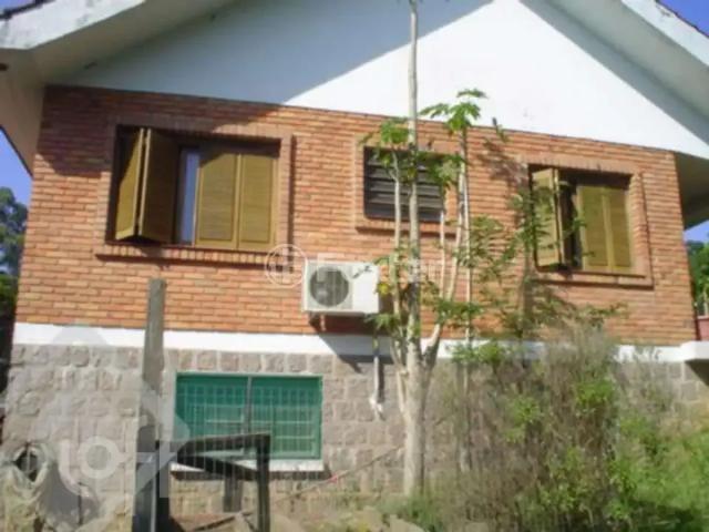 Casa / Sobrado para Venda em Porto Alegre/RS Vila Nova 3 Quartos