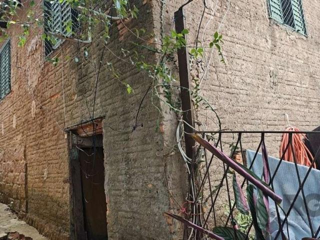 Casa / Sobrado para Venda em Porto Alegre/RS Vila Nova 3 Quartos
