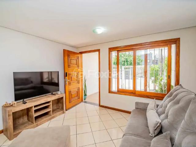 Casa / Sobrado para Venda em Porto Alegre/RS Vila Nova 3 Quartos