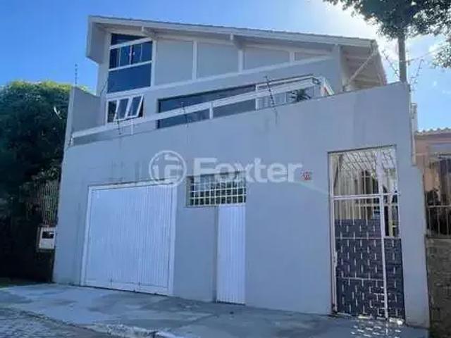 Casa / Sobrado para Venda em Porto Alegre/RS Vila Nova 3 Quartos