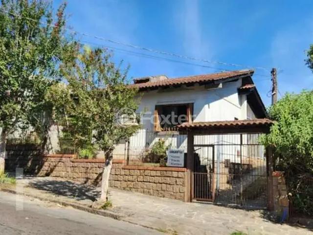Casa / Sobrado para Venda em Porto Alegre/RS Vila Nova 3 Quartos