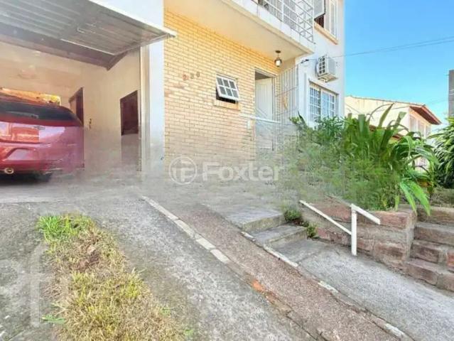 Casa / Sobrado para Venda em Porto Alegre/RS Vila Nova 4 Quartos