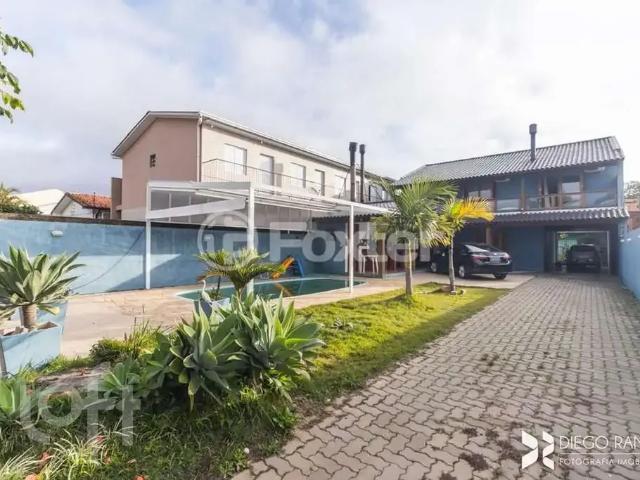 Casa / Sobrado para Venda em Porto Alegre/RS Vila Nova 4 Quartos