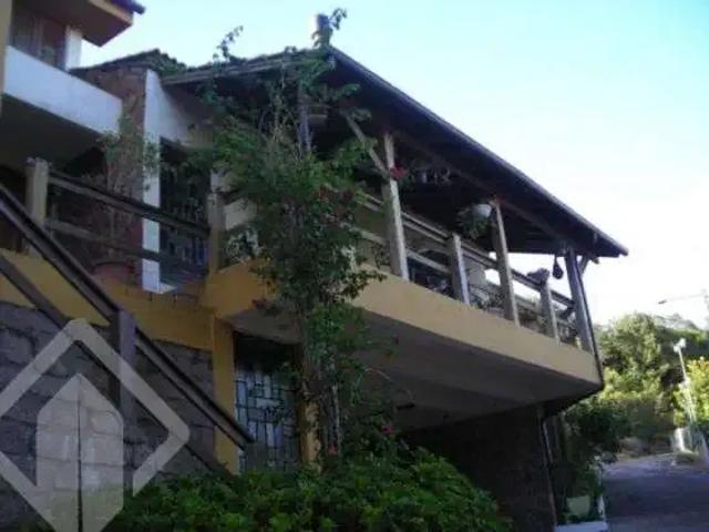 Casa / Sobrado para Venda em Porto Alegre/RS Vila Nova 4 Quartos