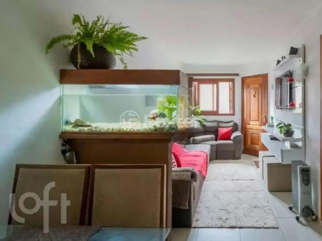 Casa / Sobrado para Venda em Porto Alegre/RS Vila Nova 4 Quartos