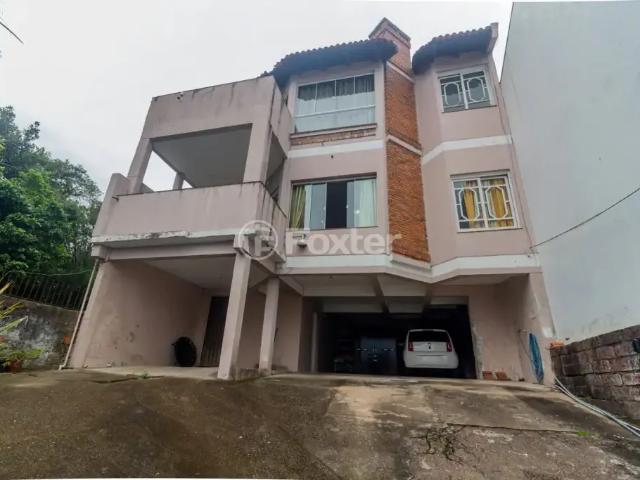 Casa / Sobrado para Venda em Porto Alegre/RS Vila Nova 5 Quartos