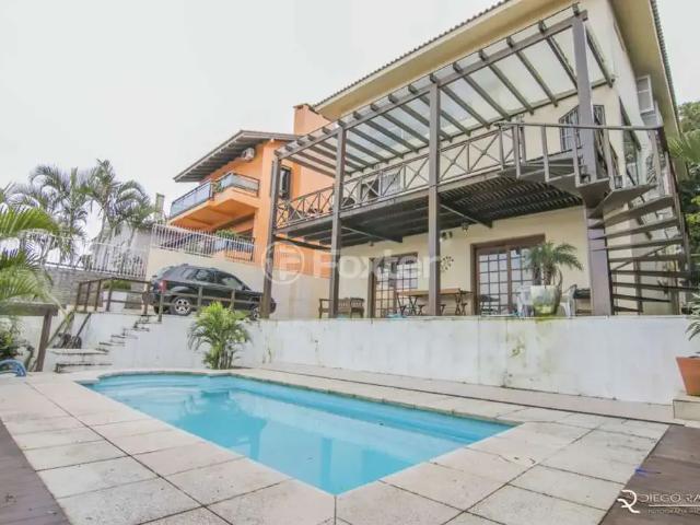 Casa / Sobrado para Venda em Porto Alegre/RS Vila Assunção 4 Quartos