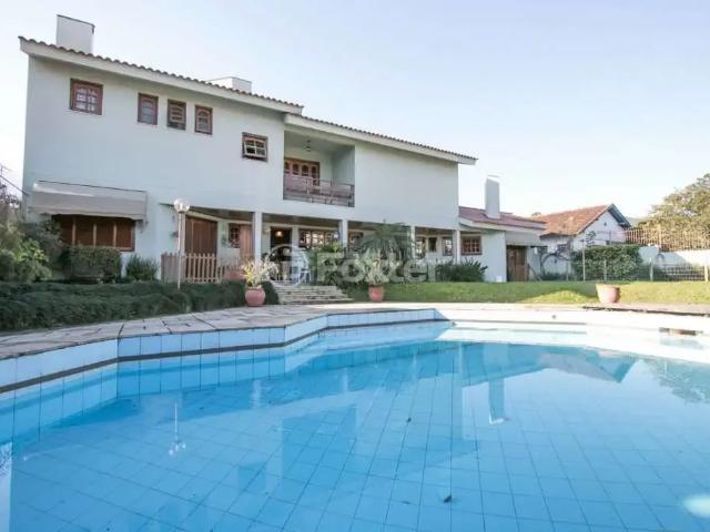 Casa / Sobrado para Venda em Porto Alegre/RS Vila Assunção 5 Quartos