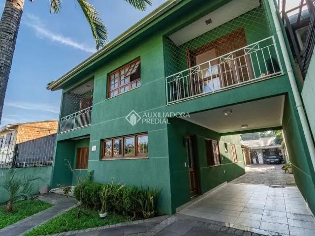 Casa / Sobrado para Venda em Porto Alegre/RS Vila Jardim 4 Quartos