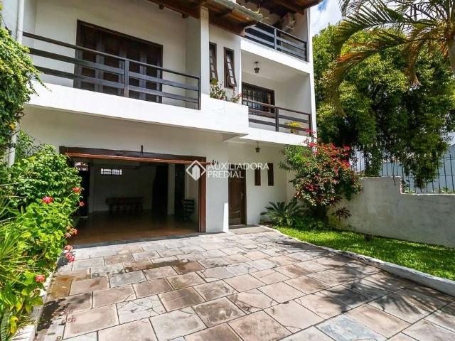 Casa / Sobrado para Venda em Porto Alegre/RS Vila Jardim 4 Quartos