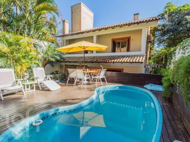 Casa / Sobrado para Venda em Porto Alegre/RS Vila Jardim 4 Quartos