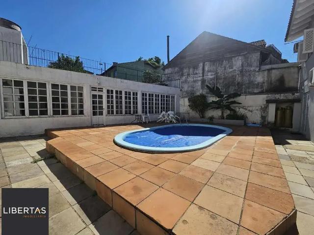 Casa / Sobrado para Venda em Porto Alegre/RS Vila Jardim 4 Quartos