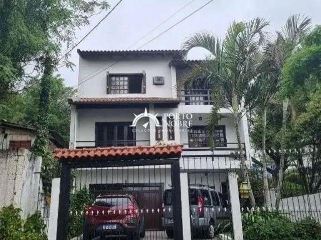 Casa / Sobrado para Venda em Porto Alegre/RS Vila Jardim 4 Quartos