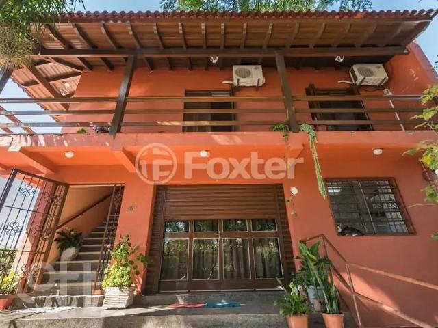 Casa / Sobrado para Venda em Porto Alegre/RS Vila Jardim 4 Quartos