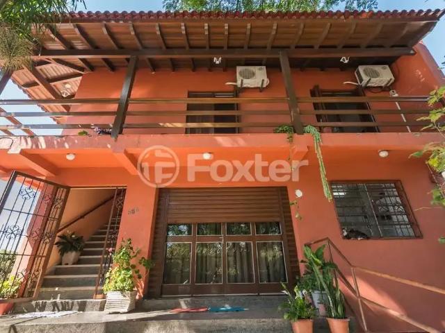 Casa / Sobrado para Venda em Porto Alegre/RS Vila Jardim 4 Quartos