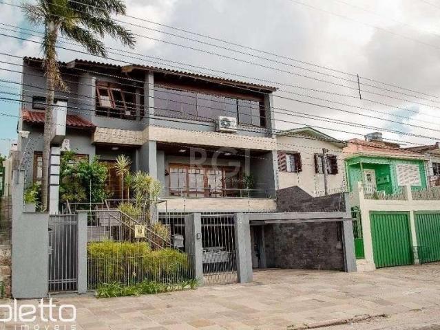 Casa / Sobrado para Venda em Porto Alegre/RS Vila Jardim 5 Quartos