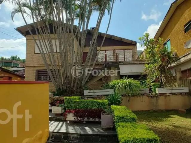 Casa / Sobrado para Venda em Porto Alegre/RS Vila Jardim 5 Quartos