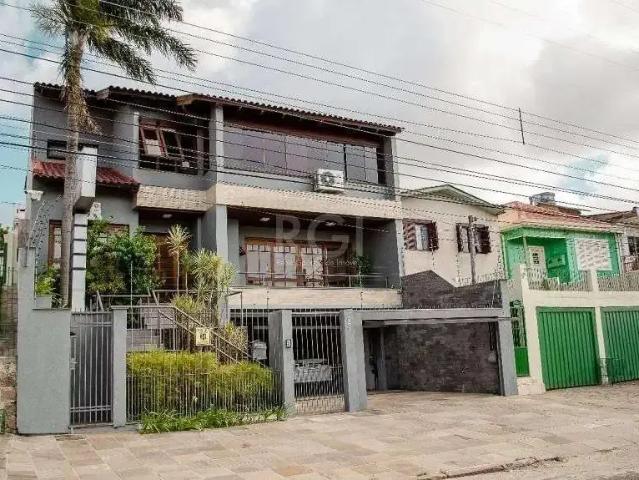 Casa / Sobrado para Venda em Porto Alegre/RS Vila Jardim 5 Quartos