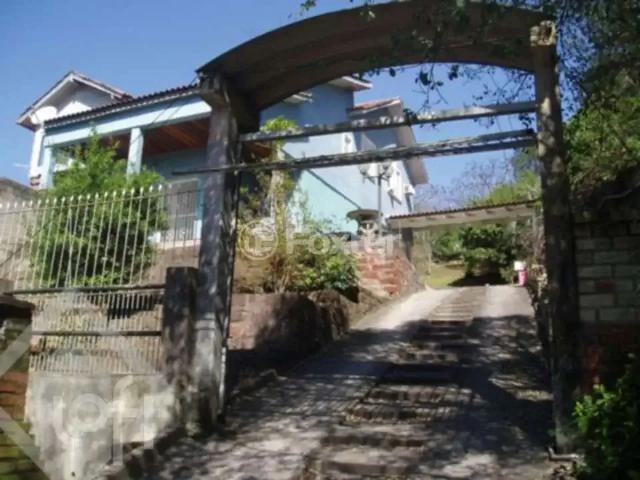 Casa / Sobrado para Venda em Porto Alegre/RS Agronomia 4 Quartos