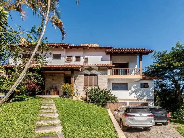 Casa / Sobrado para Venda em Porto Alegre/RS Agronomia 4 Quartos