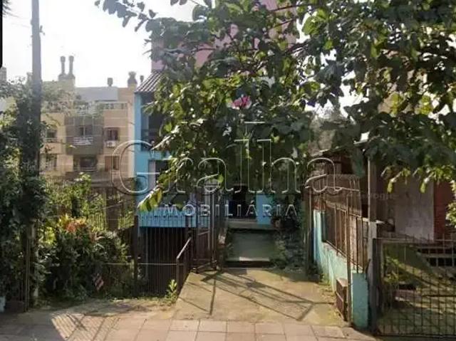 Casa / Sobrado para Venda em Porto Alegre/RS Auxiliadora 4 Quartos