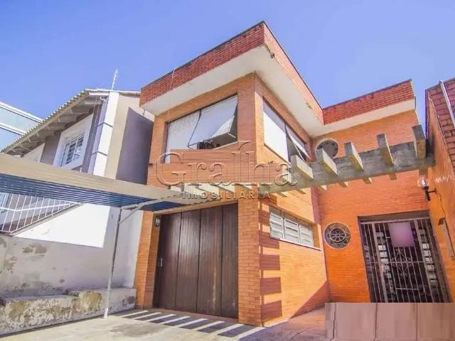Casa / Sobrado para Venda em Porto Alegre/RS Auxiliadora 4 Quartos