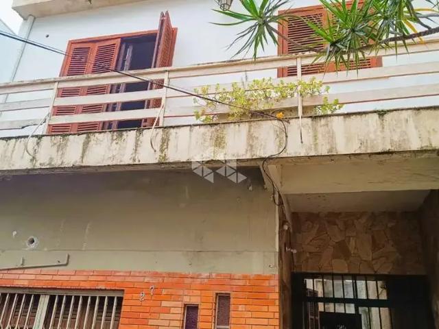 Casa / Sobrado para Venda em Porto Alegre/RS Auxiliadora 4 Quartos