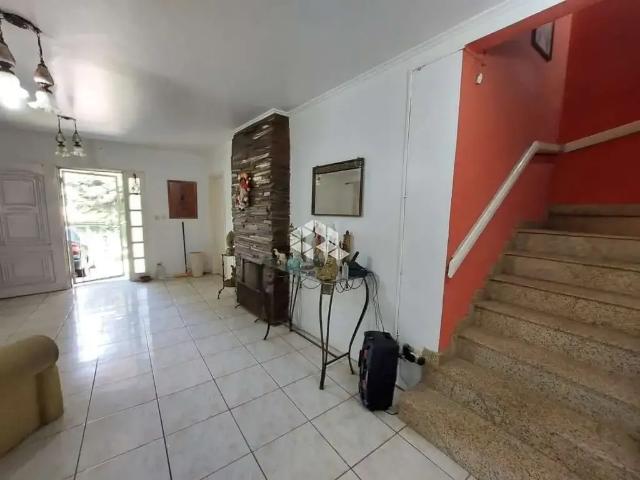 Casa / Sobrado para Venda em Porto Alegre/RS Belém Velho 4 Quartos