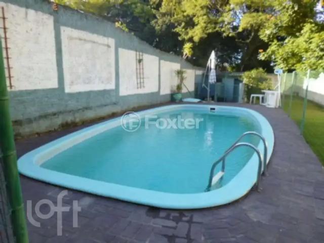 Casa / Sobrado para Venda em Porto Alegre/RS Belém Velho 4 Quartos