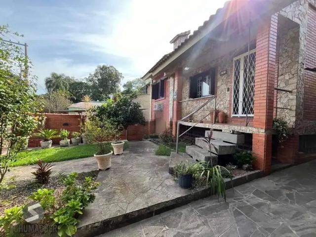Casa / Sobrado para Venda em Porto Alegre/RS Belém Velho 4 Quartos