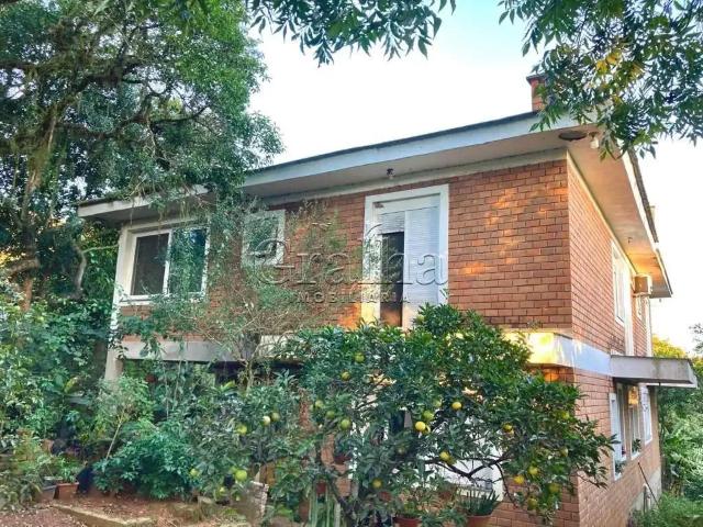 Casa / Sobrado para Venda em Porto Alegre/RS Belém Velho 5 Quartos