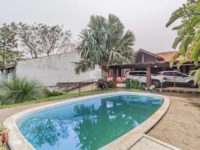 Casa / Sobrado para Venda em Porto Alegre/RS Belém Novo 3 Quartos