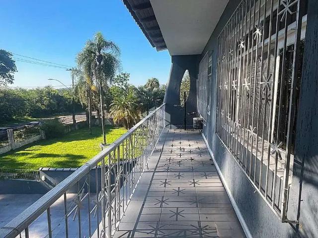 Casa / Sobrado para Venda em Porto Alegre/RS Belém Novo 4 Quartos