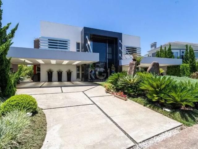 Casa / Sobrado para Venda em Porto Alegre/RS Belém Novo 5 Quartos