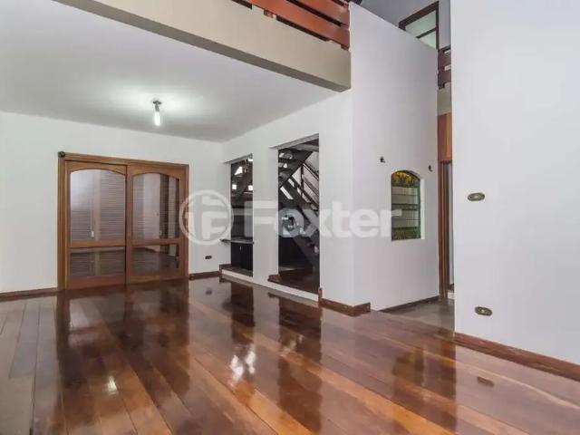 Casa / Sobrado para Venda em Porto Alegre/RS Boa Vista 4 Quartos
