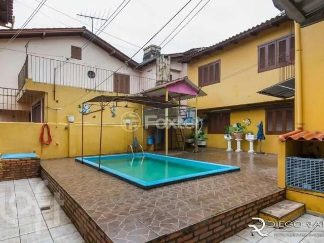 Casa / Sobrado para Venda em Porto Alegre/RS Campo Novo 6 Quartos