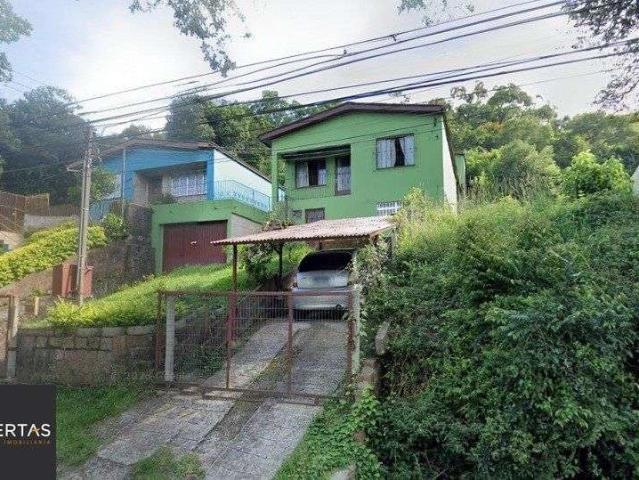 Casa / Sobrado para Venda em Porto Alegre/RS Cascata 5 Quartos