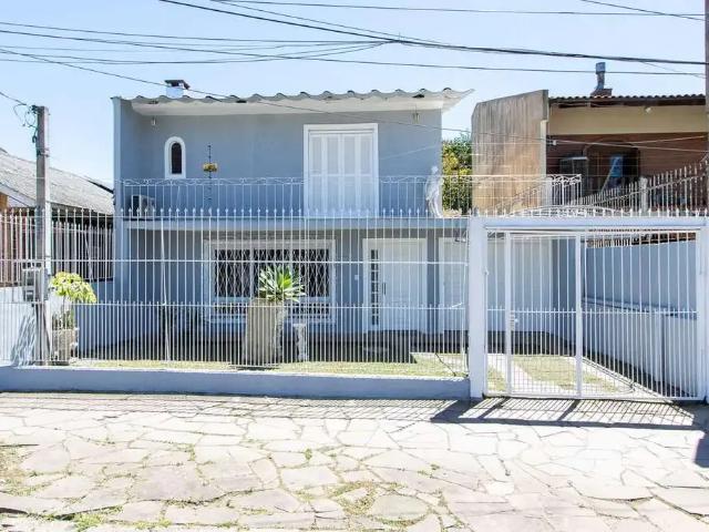 Casa / Sobrado para Venda em Porto Alegre/RS Cavalhada 3 Quartos