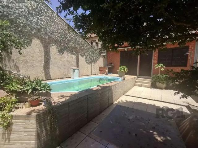 Casa / Sobrado para Venda em Porto Alegre/RS Cavalhada 4 Quartos