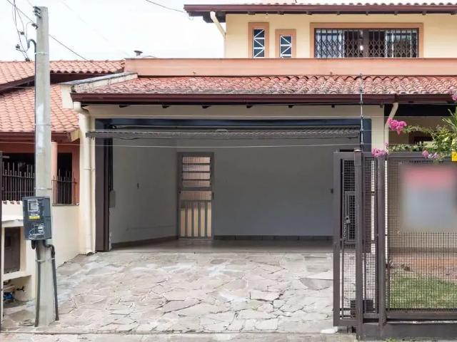 Casa / Sobrado para Venda em Porto Alegre/RS Cavalhada 4 Quartos