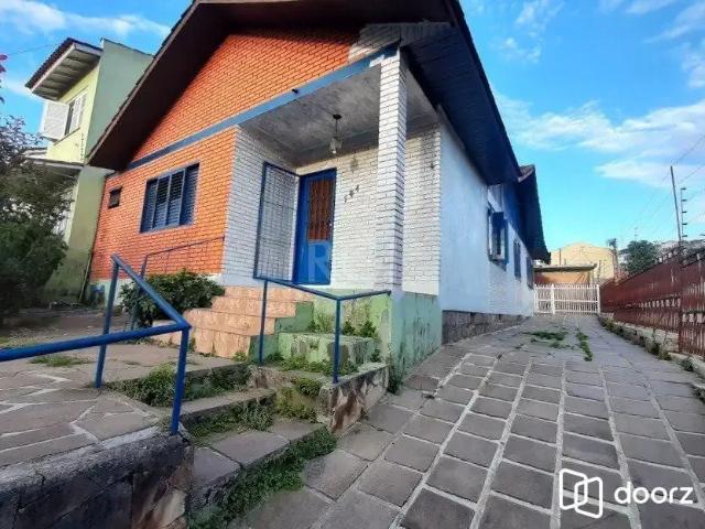 Casa / Sobrado para Venda em Porto Alegre/RS Cavalhada 4 Quartos