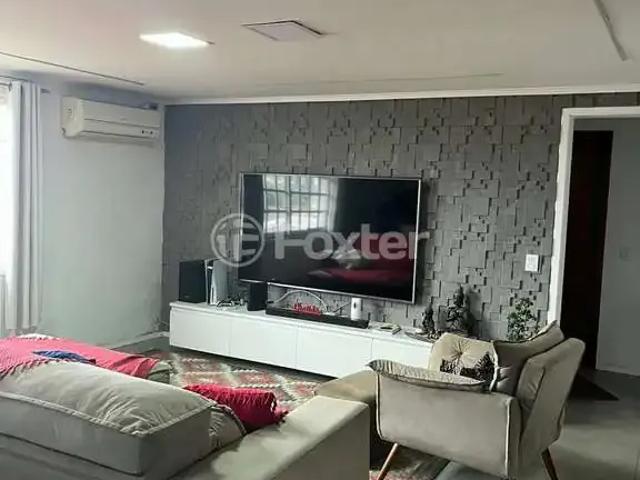Casa / Sobrado para Venda em Porto Alegre/RS Cavalhada 4 Quartos