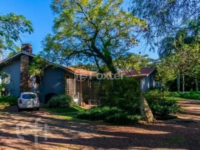 Casa / Sobrado para Venda em Porto Alegre/RS Cavalhada 4 Quartos