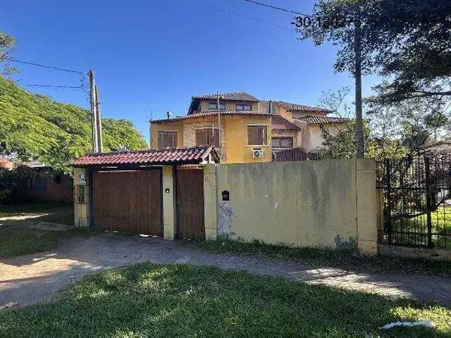 Casa / Sobrado para Venda em Porto Alegre/RS Cavalhada 4 Quartos