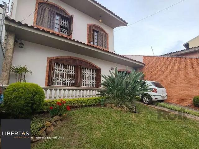 Casa / Sobrado para Venda em Porto Alegre/RS Cavalhada 4 Quartos