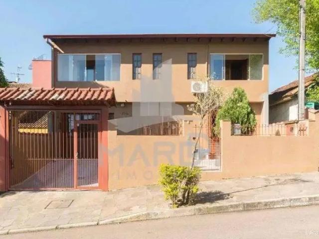 Casa / Sobrado para Venda em Porto Alegre/RS Cavalhada 4 Quartos
