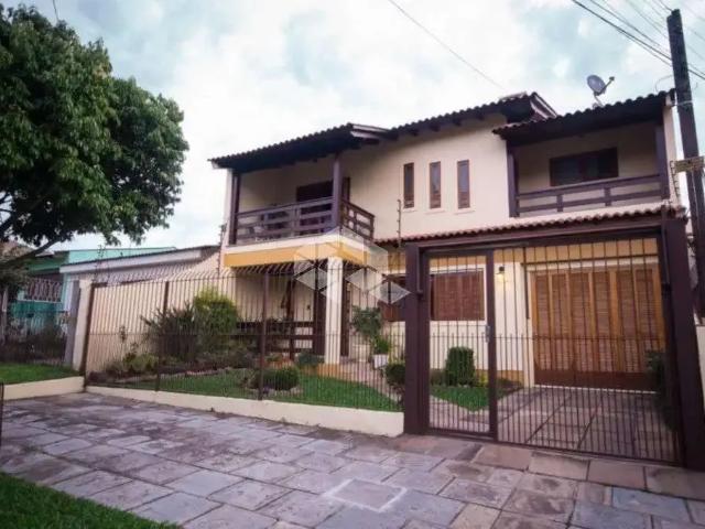 Casa / Sobrado para Venda em Porto Alegre/RS Cavalhada 4 Quartos