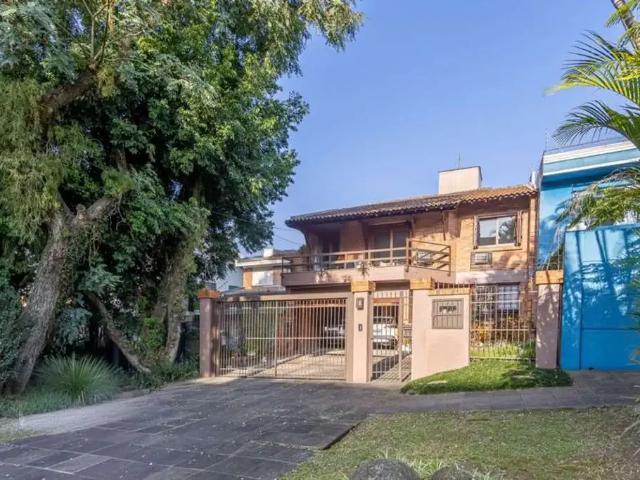 Casa / Sobrado para Venda em Porto Alegre/RS Chácara das Pedras 4 Quartos