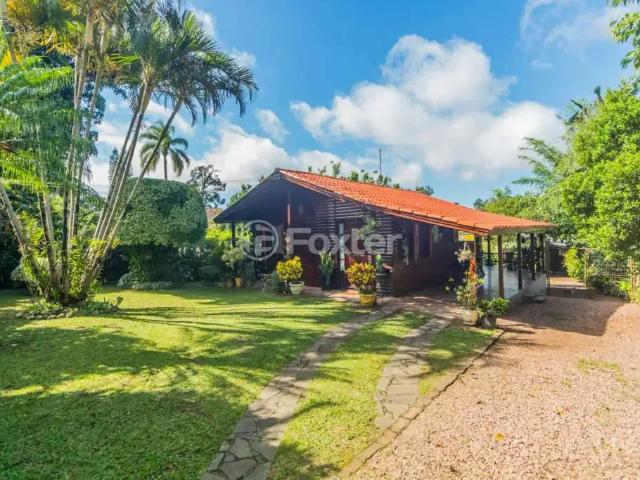 Casa / Sobrado para Venda em Porto Alegre/RS Chapéu do Sol 5 Quartos